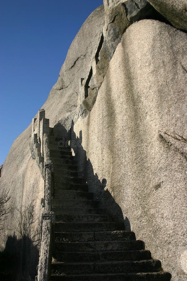 Stone steps on rock cliff stock photo. Image of carved - 4321204
