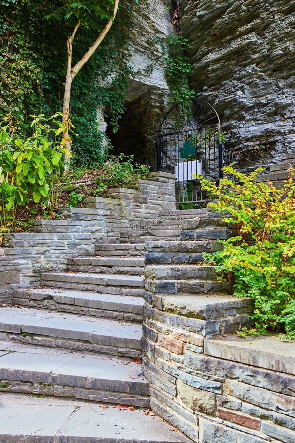 Stone Steps Winding Up into Cliff Wall with Tunnel Stock Photo - Image ...