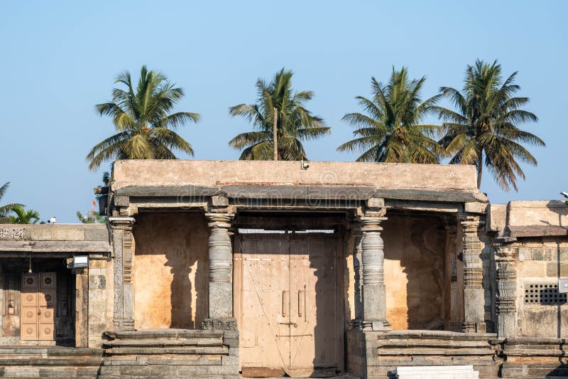 A Stone Structure with Columns Surrounded by Palm Trees Stock Image ...
