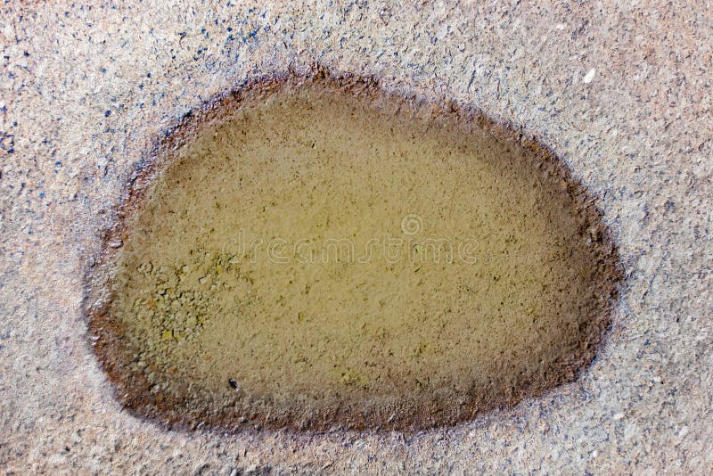 Stone Surface with a Small Puddle Stock Photo - Image of design ...