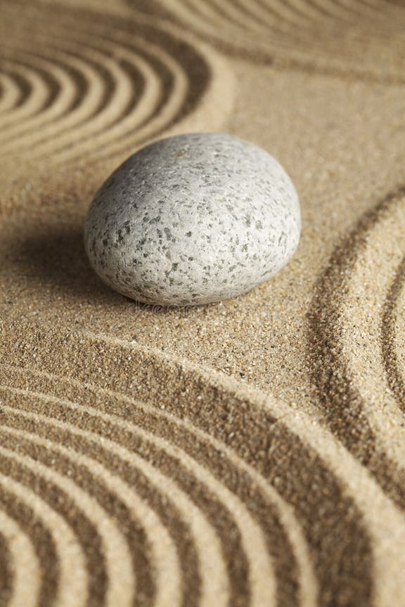 Stone Surrounded by Rippled Sand Stock Photo - Image of studio, smooth ...