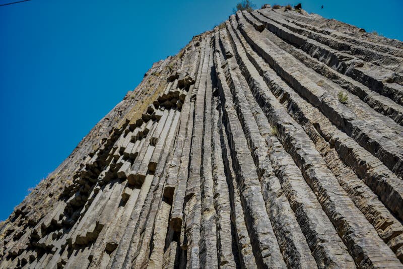 The Symphony of Stones with Temple of Garni on the Hilltop in Afar ...