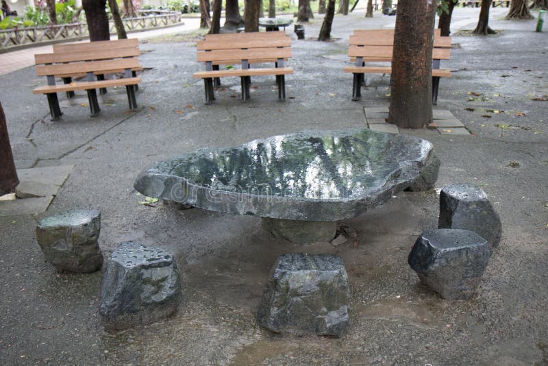 The Stone Table and Bench in the Garden. Stock Photo - Image of bench ...