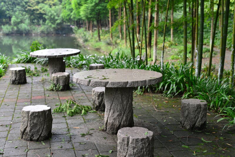 Stone tables and stools stock image. Image of outdated - 36355011