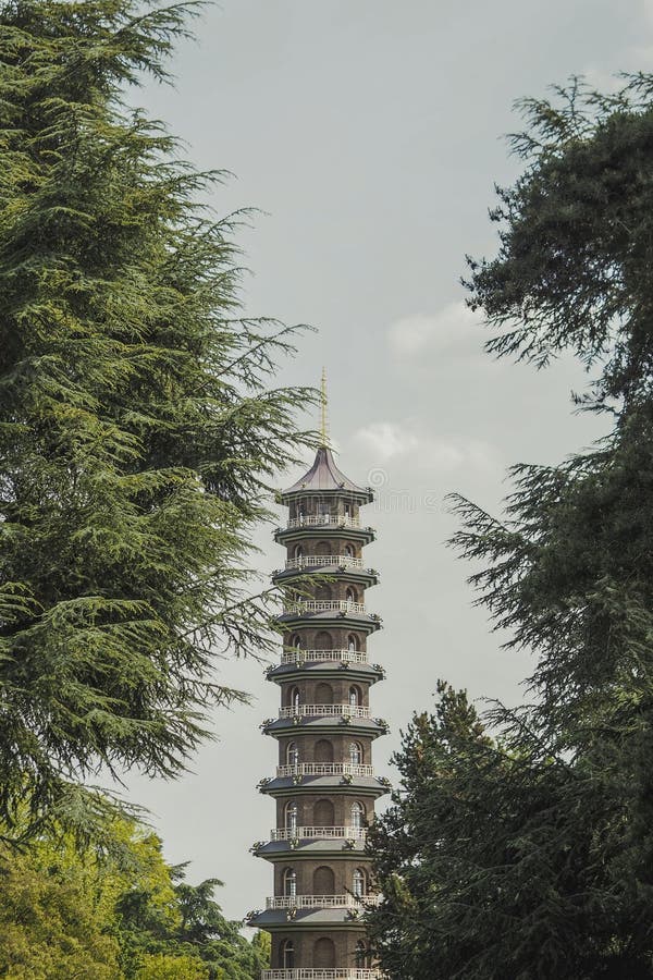 Stone Tall Chinese Tower Standing Amidst Trees and Plants in a Park ...