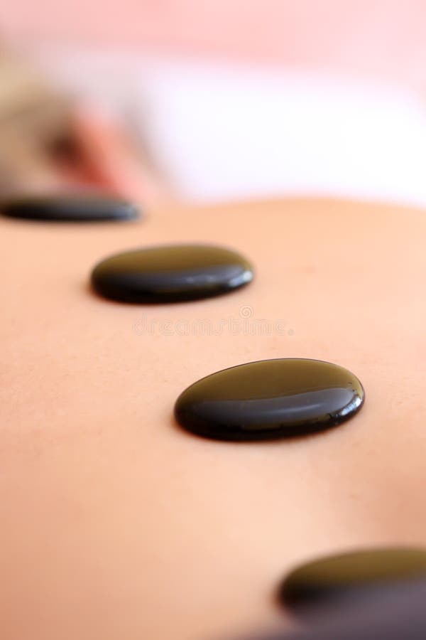 Massage with hot stones stock image. Image of copy, black - 5116901