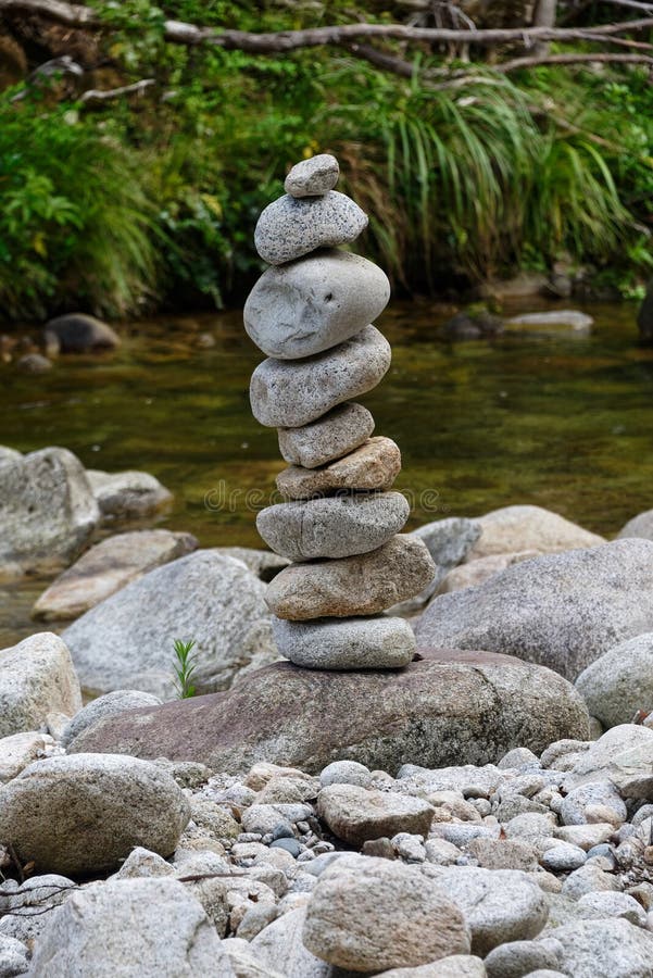 A stone tower by the river stock image. Image of created - 223701671