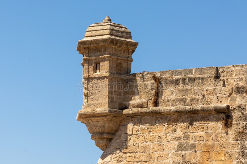 Stone Turret on a Wall Against the Blue Sky on a Sunny Day Stock Image ...