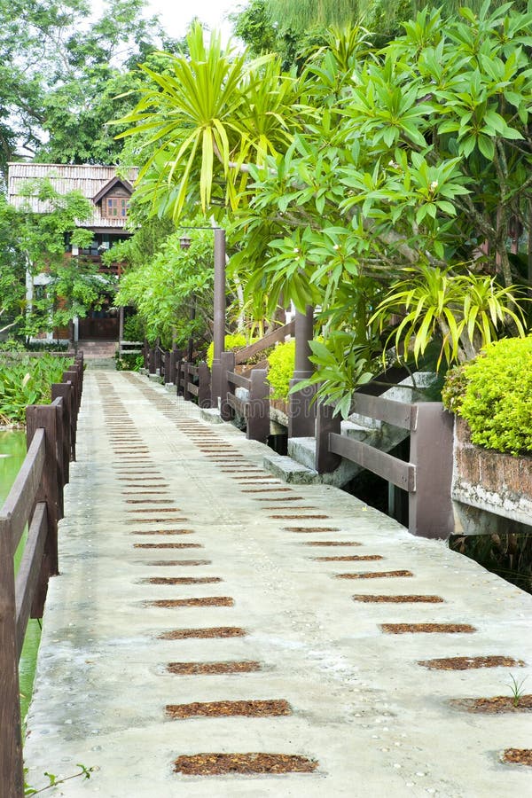 Stone Walkway in the Park with Green Grass Stock Image - Image of ...
