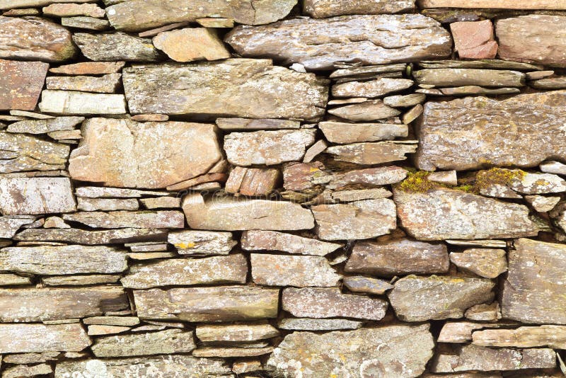 Rust Colored Stone Wall stock photo. Image of neutral - 3258474