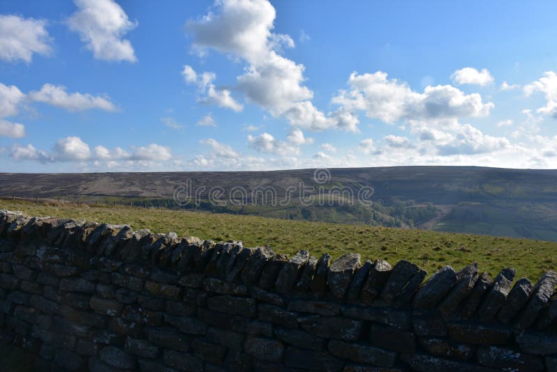 Stone Wall Along a Grass Pasture and Rolling Hills Stock Image - Image ...