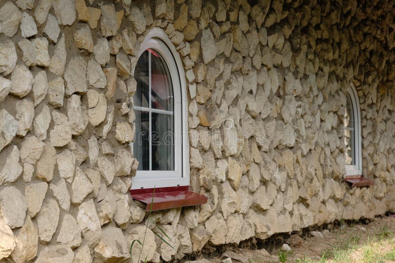 The Stone Wall with Arched Windows in the Antique Style. Stock Image ...