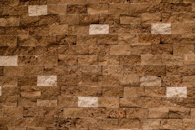 Stone Wall As a Background or Texture. Beautiful Brown Shell Bricks ...