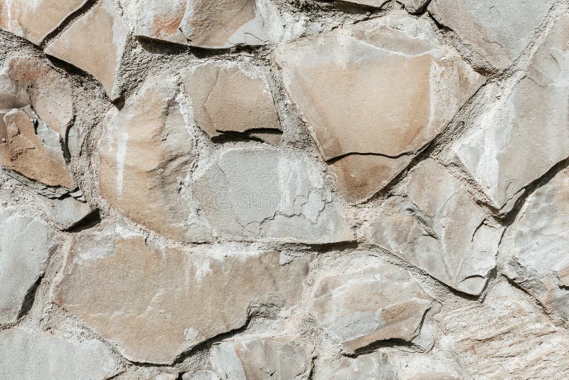 Stone Wall Background. Bumpy Beige Stone Surface. Stock Photo - Image ...