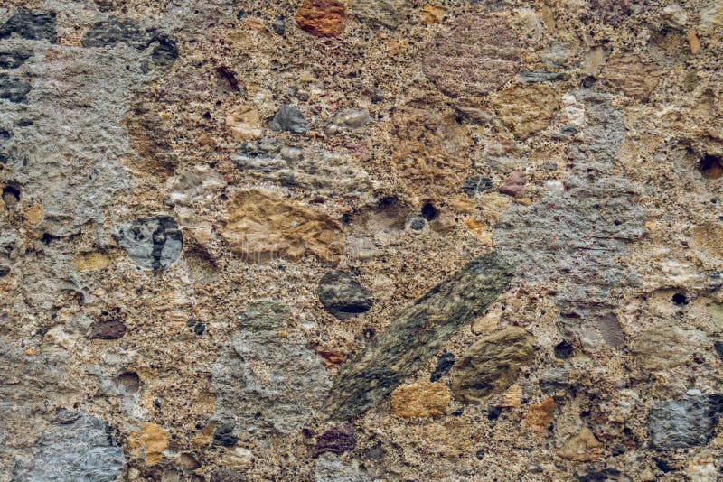 Stone Wall Background Wall Made of Cavern Rock Stock Photo - Image of ...