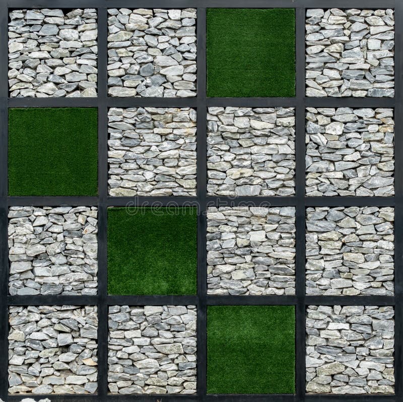 Stone Wall Block with Green Artificial Grass Stock Image - Image of ...