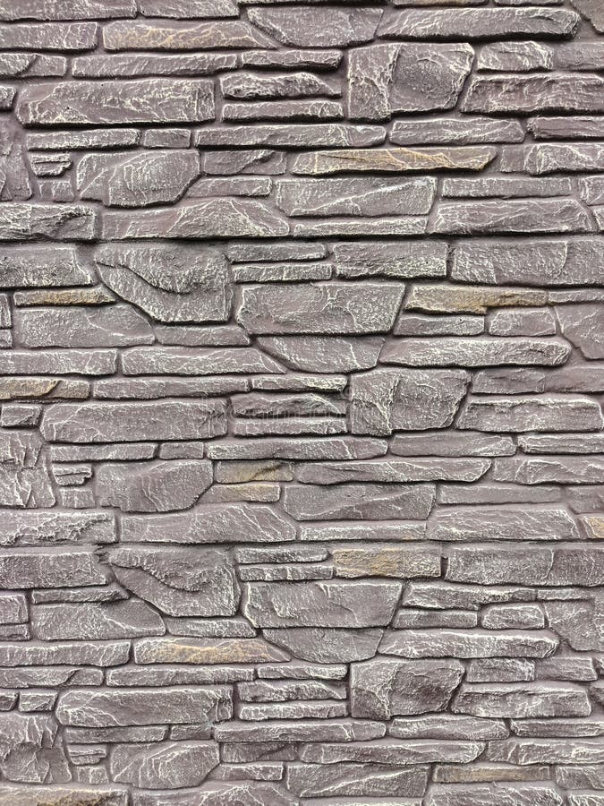 A Stone Wall of Bricks of Various Shapes on the Whole Background Stock ...