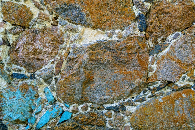 The Stone Wall of the Building is Covered with Moss. Background ...