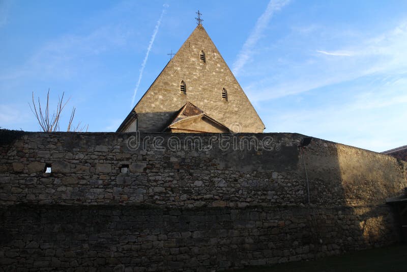 Stone Wall with Church in Rust Stock Image - Image of brick, crucifix ...
