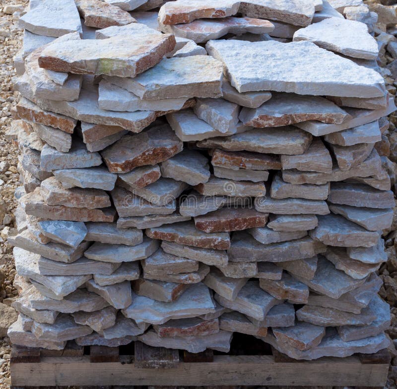 Stone Wall Cladding Made Of Horizontal Gray Brown And