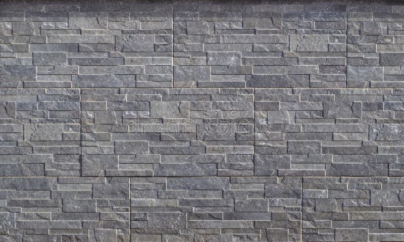 Stone Wall Cladding Made Of Horizontal Gray Brown And