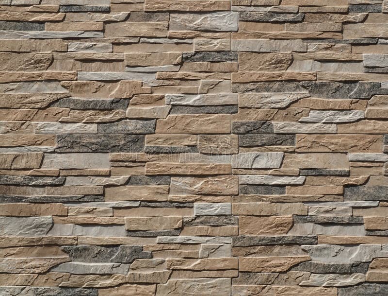 Stone Wall Cladding Made Of Horizontal Gray Brown And