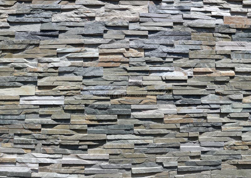 Stone Wall Cladding Made of Uneven Natural Rock Strips of Different ...
