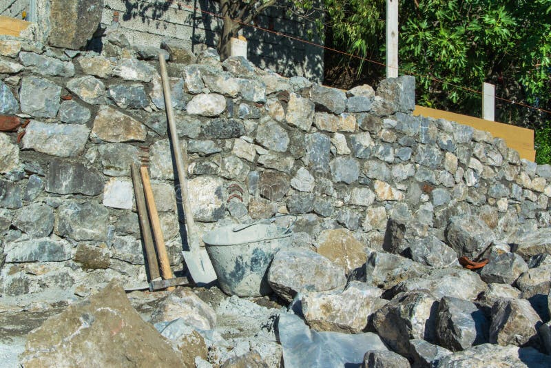 Tools for Laying Tiles on Floor at Construction Site Stock Photo ...
