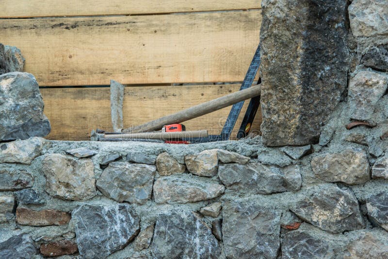 Stone Wall Construction and Masonry Tools Stock Image - Image of laying ...