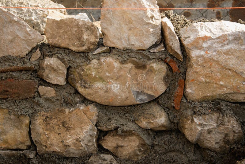 Stone Wall during Construction and Masonry Tools Stock Photo - Image of ...