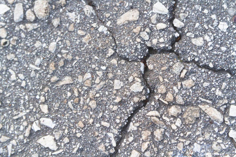 Stone Wall with Deep Cracks. Break in the Ground. Drought and ...