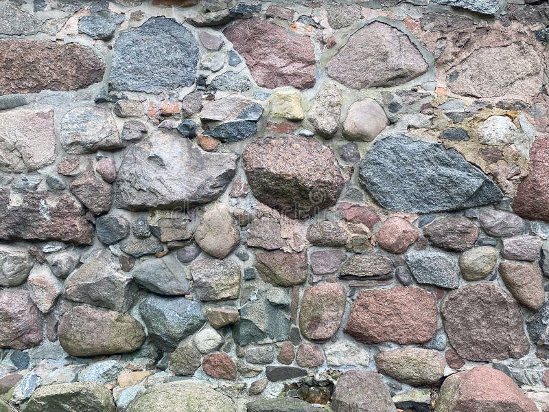 Stone Wall with Different Colors and Size of Rocks Stock Photo - Image ...