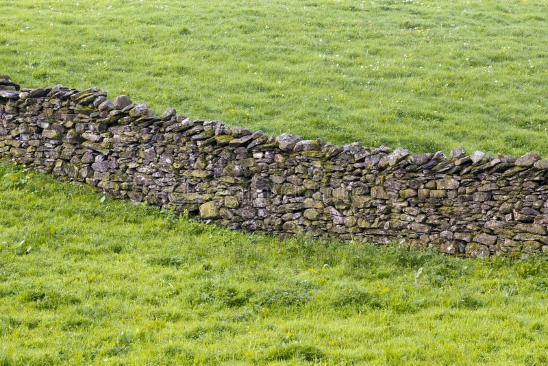 Stone wall stock image. Image of outside, united, grass - 115655271