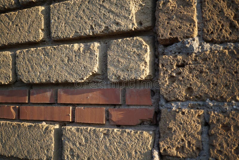 Stone wall in the sun stock image. Image of pattern - 110686505