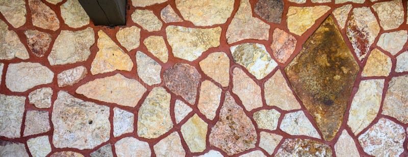 Stone Wall Made with Flagstones and Red Mortar, As an Abstract ...