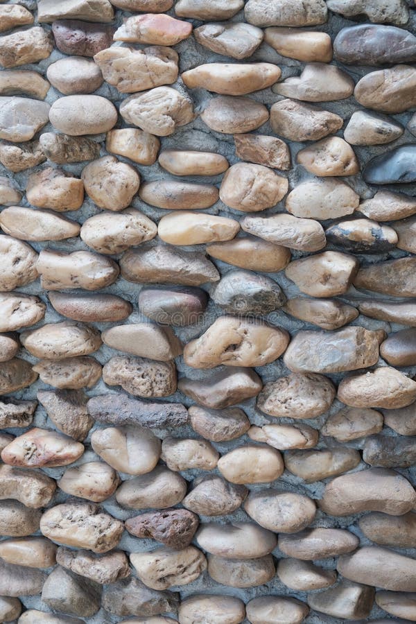 Stone Wall Made of Round Stones Stock Image - Image of cobblestones ...