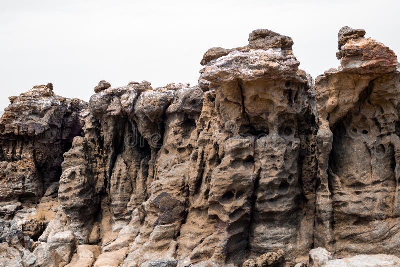 A Stone Wall Made of Strange Stones, Riddled with Holes Stock Image ...