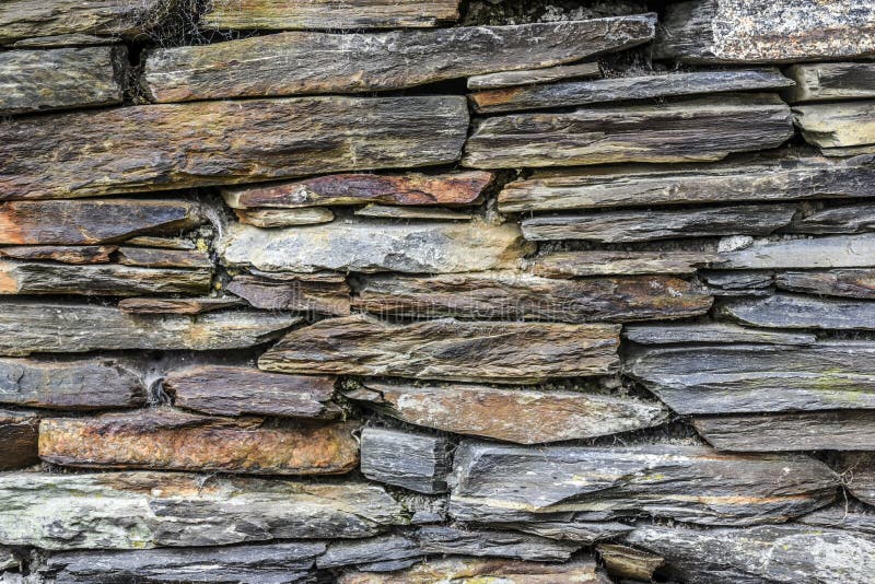 Stone Wall Made of Various Stones of Different Colors and Shapes Stock ...