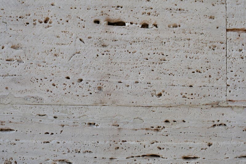 A Stone Wall Made of White Processed Sandstone Blocks. Stock Image ...