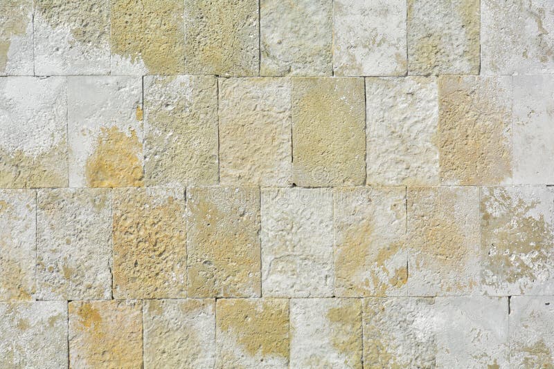 Stone Wall Made of Yellow Rectangular Blocks Background Stock Photo ...