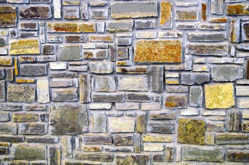 Stone Wall of Multi-colored Stones with Decorative Masonry Stock Image ...
