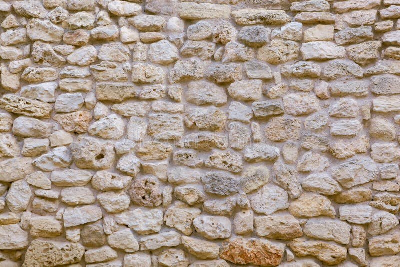 Stone Wall of Natural Stones in Different Sizes, Texture, Background ...