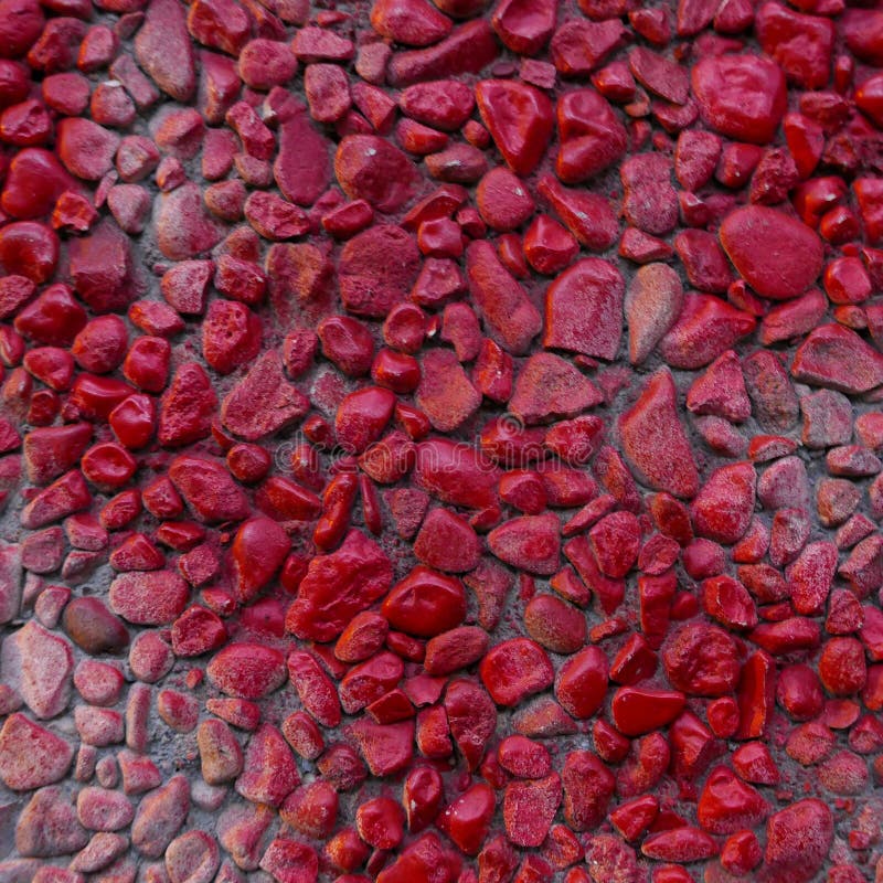 Stone wall painted red stock photo. Image of background - 231179342