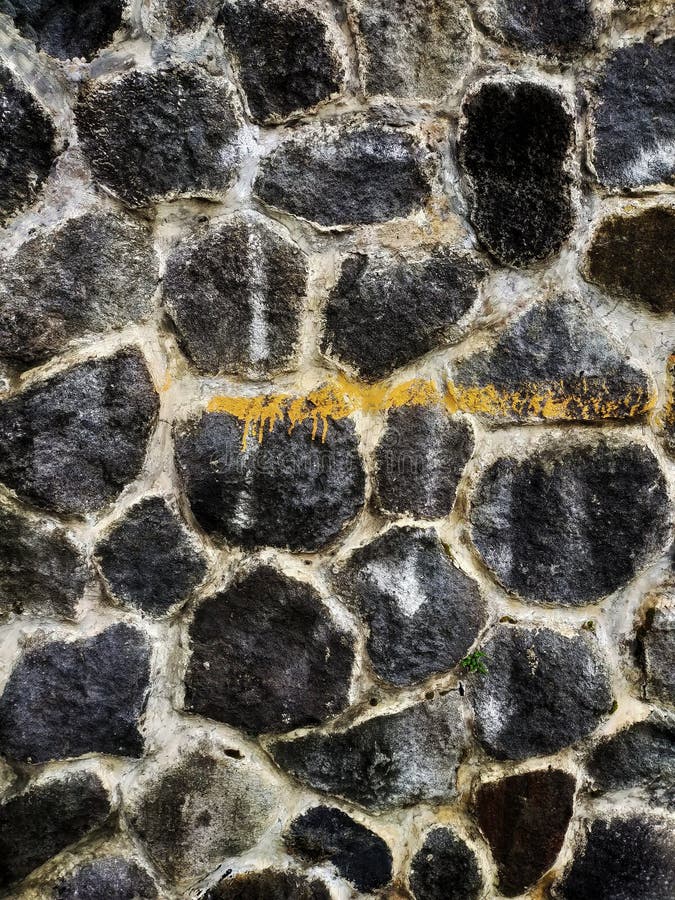 The Stone Wall Painted with Yellow Lines Stock Photo - Image of lines ...