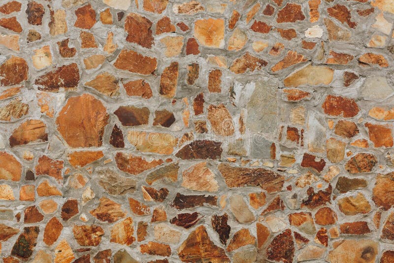 Stone Wall Pattern of Orange and Brown Stones and Concrete Stock Photo ...