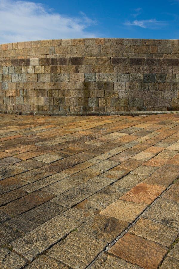 Stone wall and pavement stock image. Image of blue, presentation - 21299211