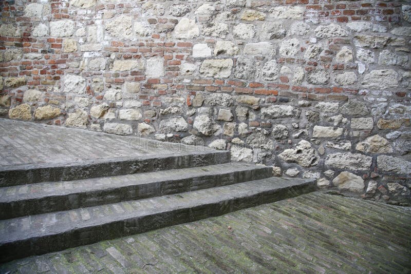 Stone Wall with Red Bricks beside a Marvel Stairs Stock Image - Image ...