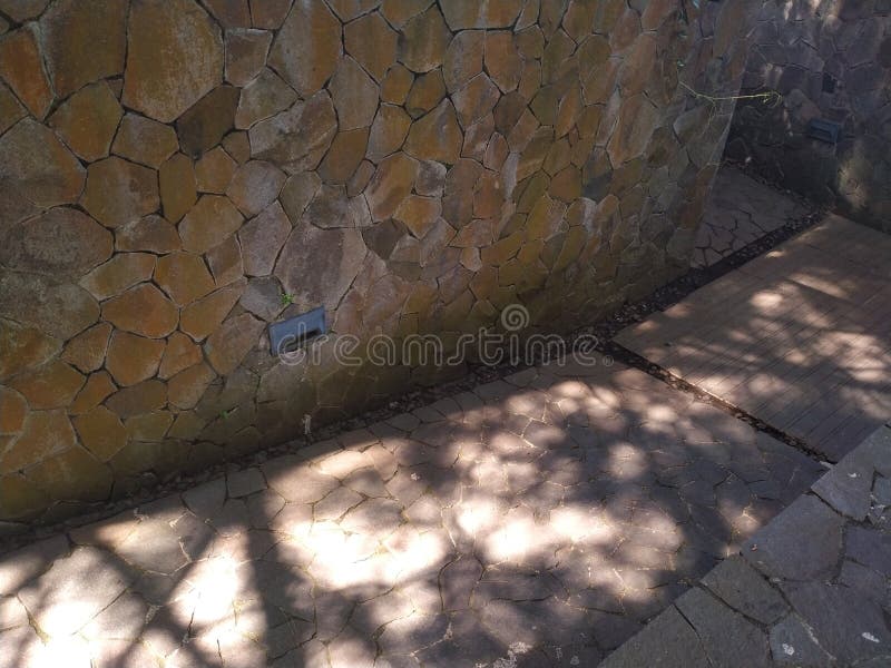 Stone Wall and Road Constructed of Fragments of Rock Stock Photo ...