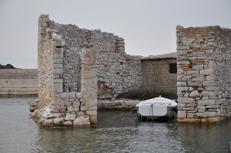 Stone Wall in the Sea and Boat in the Middle Stock Image - Image of ...