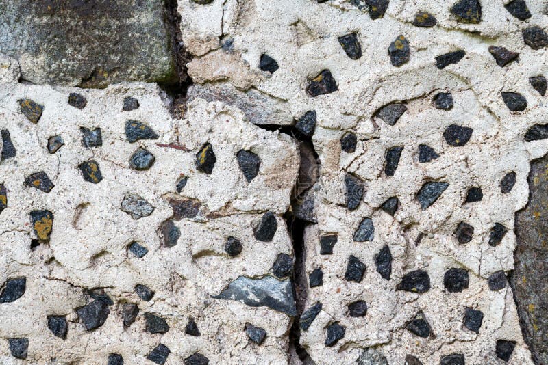 A Stone Wall with Small Embedded Stones Stock Image - Image of rock ...